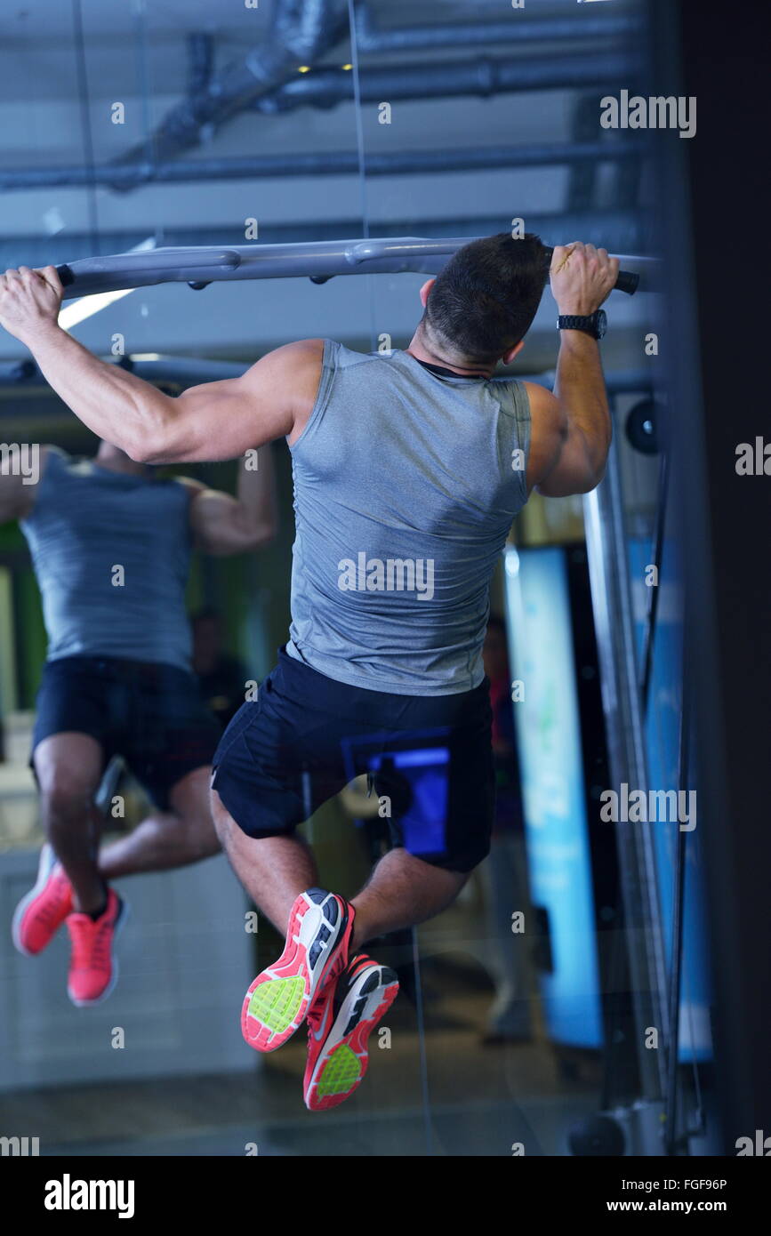 handsome man exercising at the gym Stock Photo - Alamy