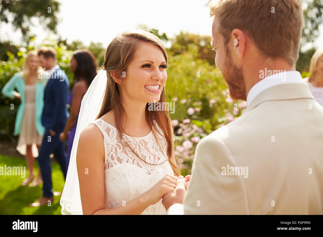 Romantic Young Couple Getting Married Outdoors Stock Photo - Alamy
