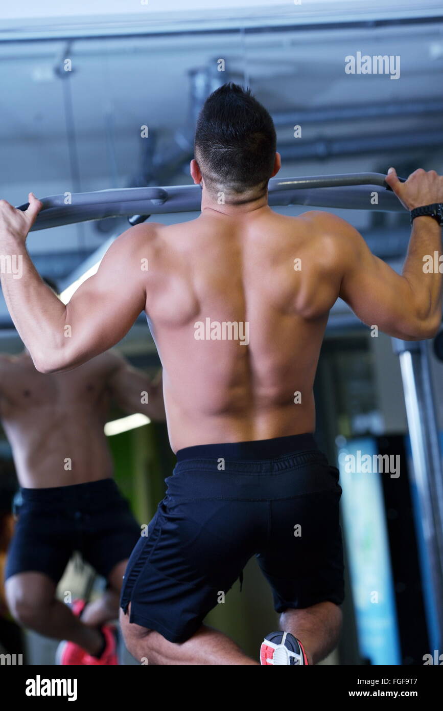handsome man exercising at the gym Stock Photo - Alamy