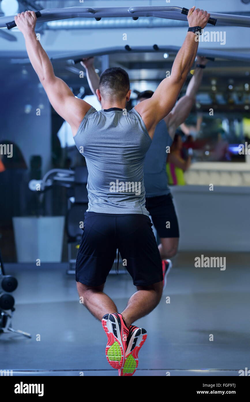 handsome man exercising at the gym Stock Photo - Alamy
