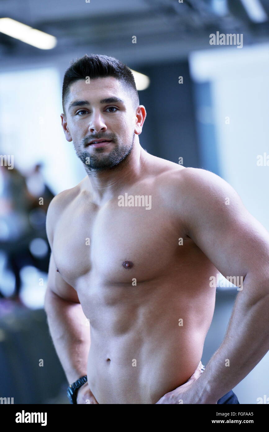 handsome man exercising at the gym Stock Photo - Alamy