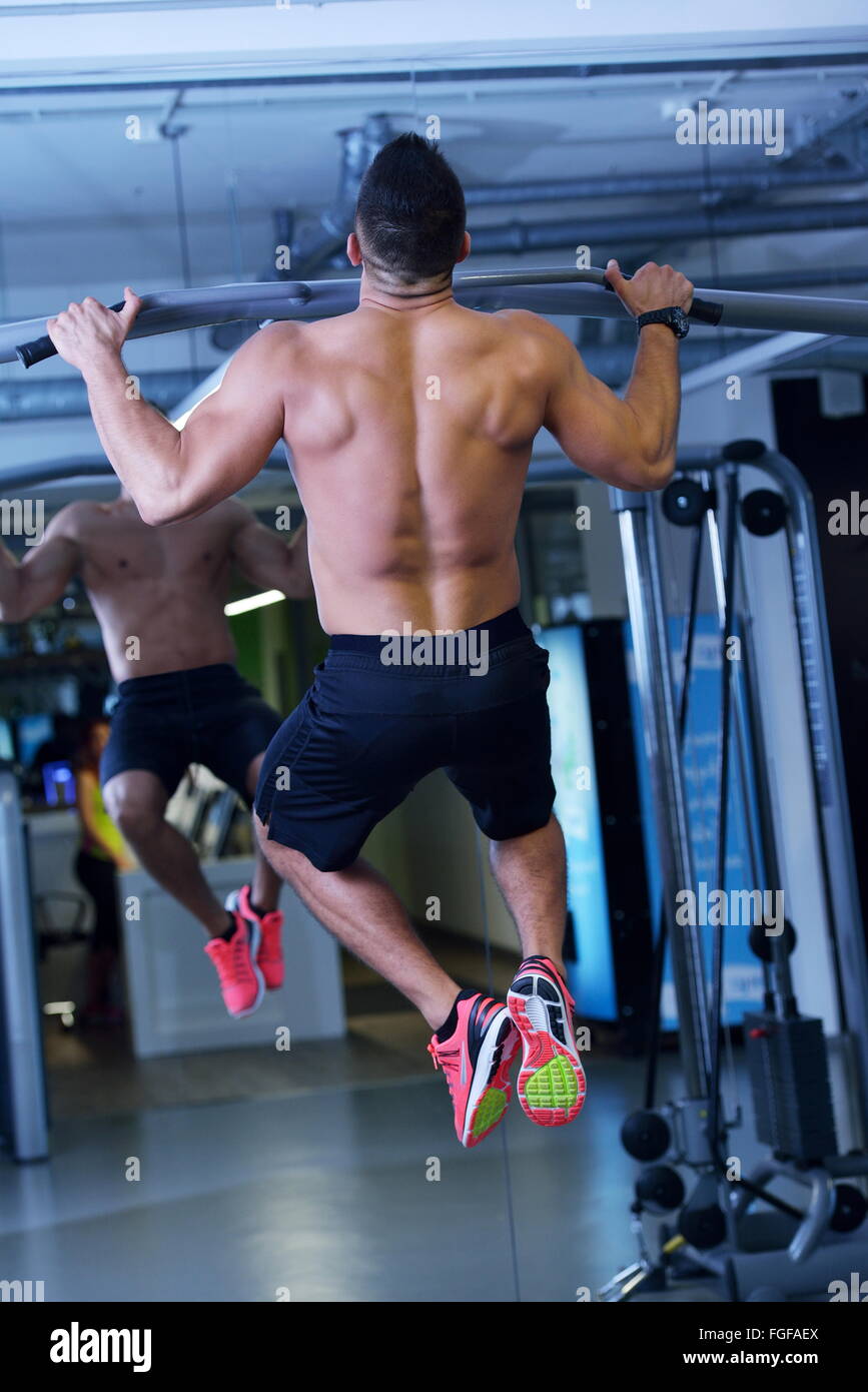 handsome man exercising at the gym Stock Photo - Alamy