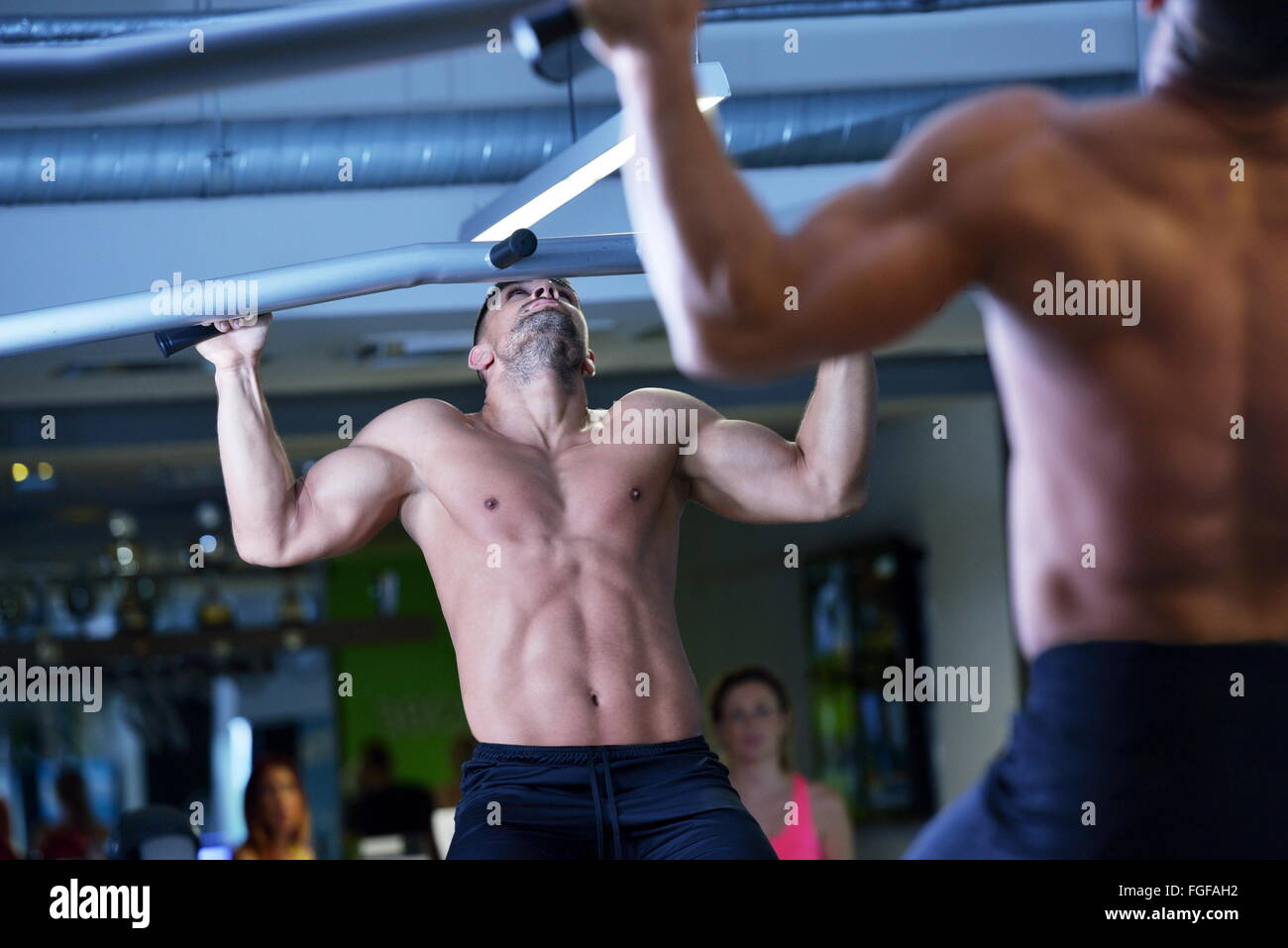 handsome man exercising at the gym Stock Photo - Alamy