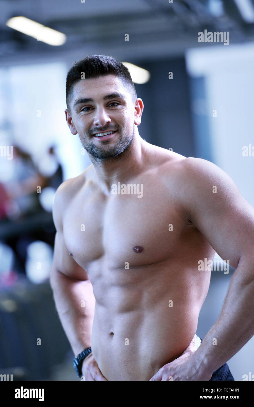 handsome man exercising at the gym Stock Photo - Alamy