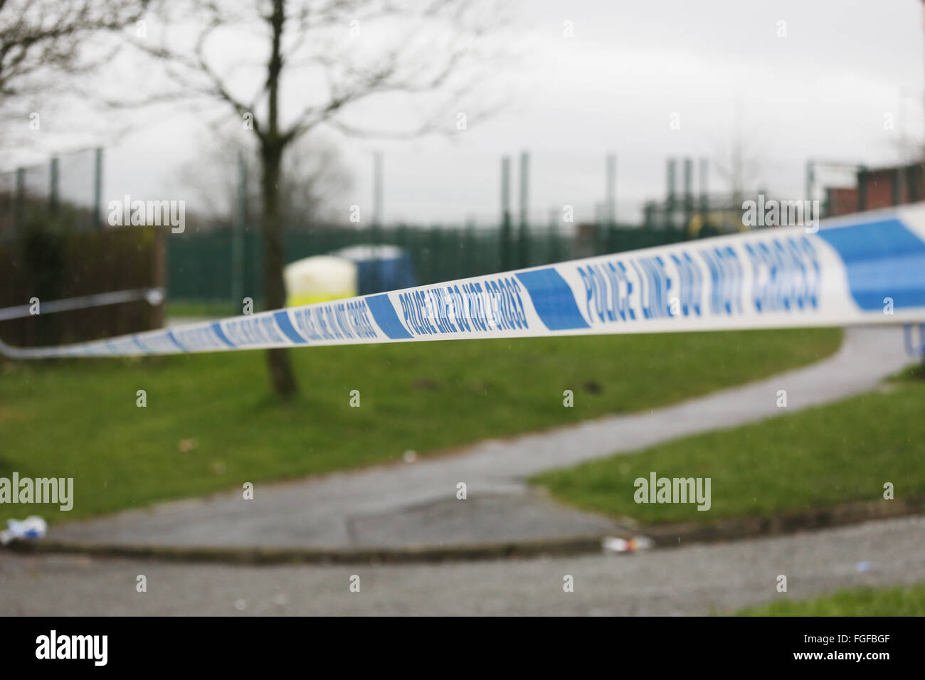Rochdale, UK. 19th Feb, 2016. Police "do not cross" tape marking a ...