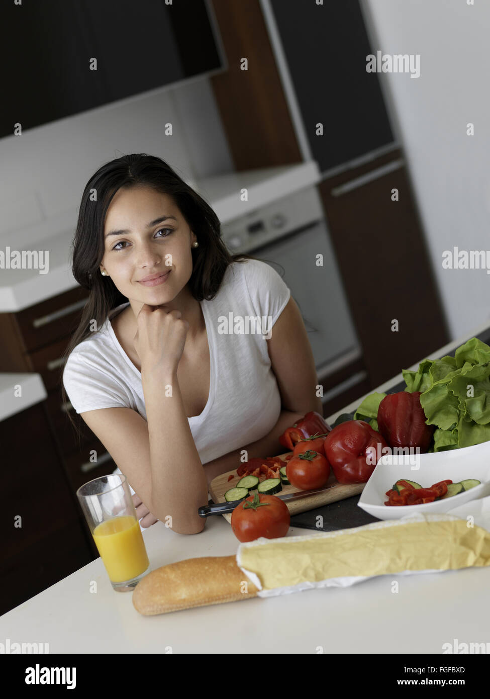Young Woman Cooking in the kitchen Stock Photo - Alamy