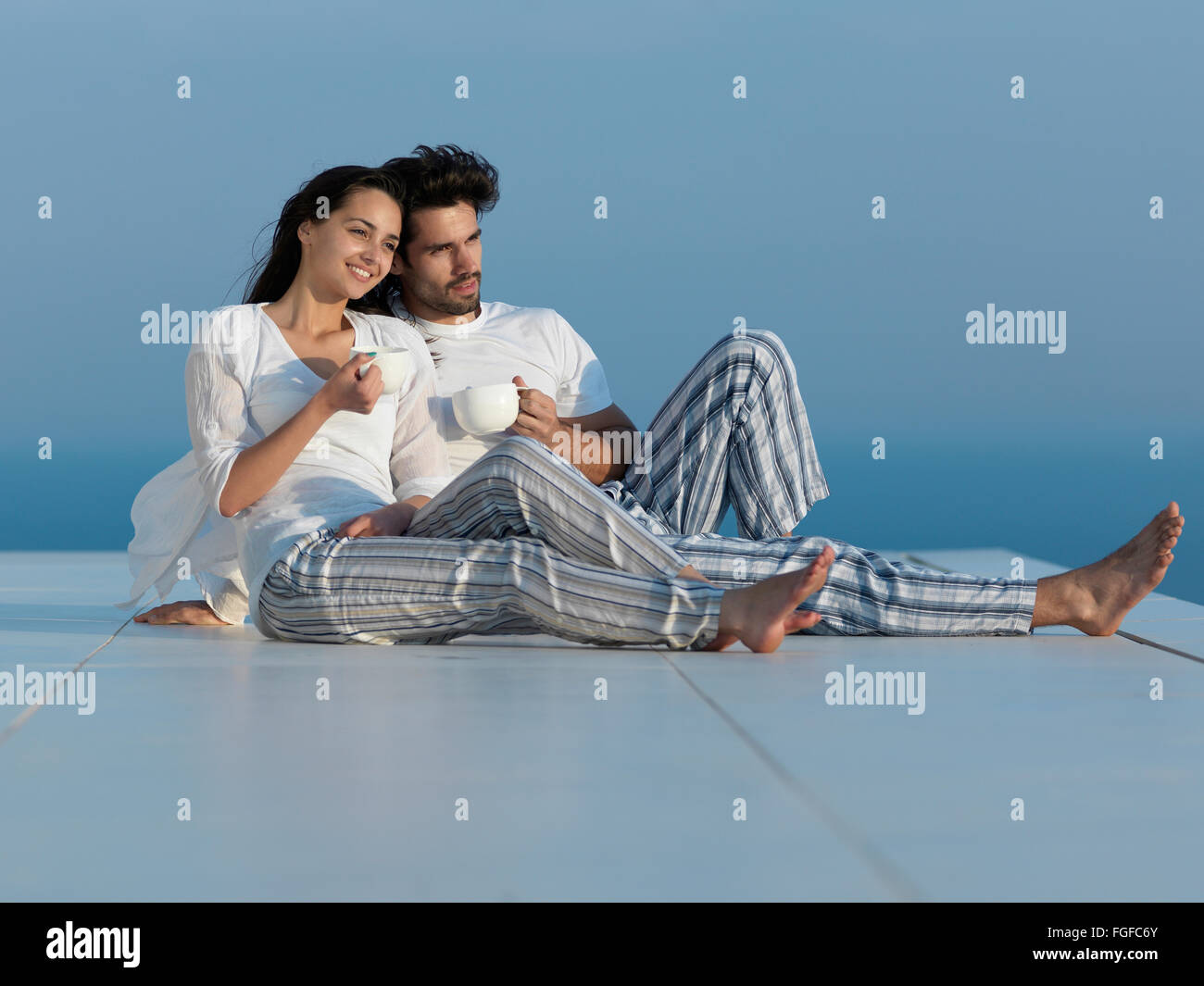 relaxed young couple at home Stock Photo - Alamy