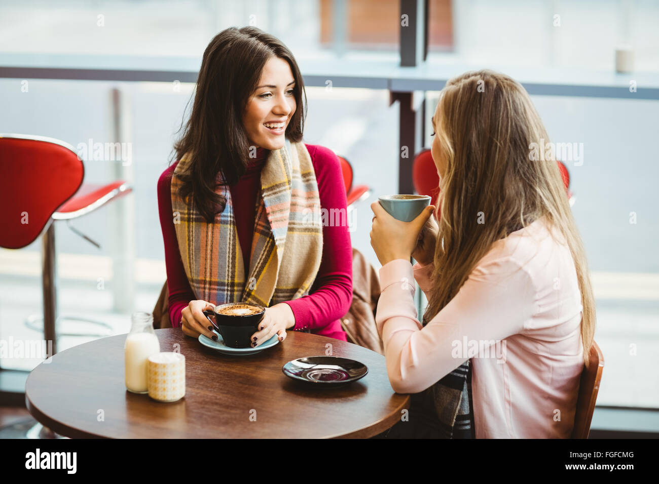 Young friends having coffee break hi-res stock photography and images ...