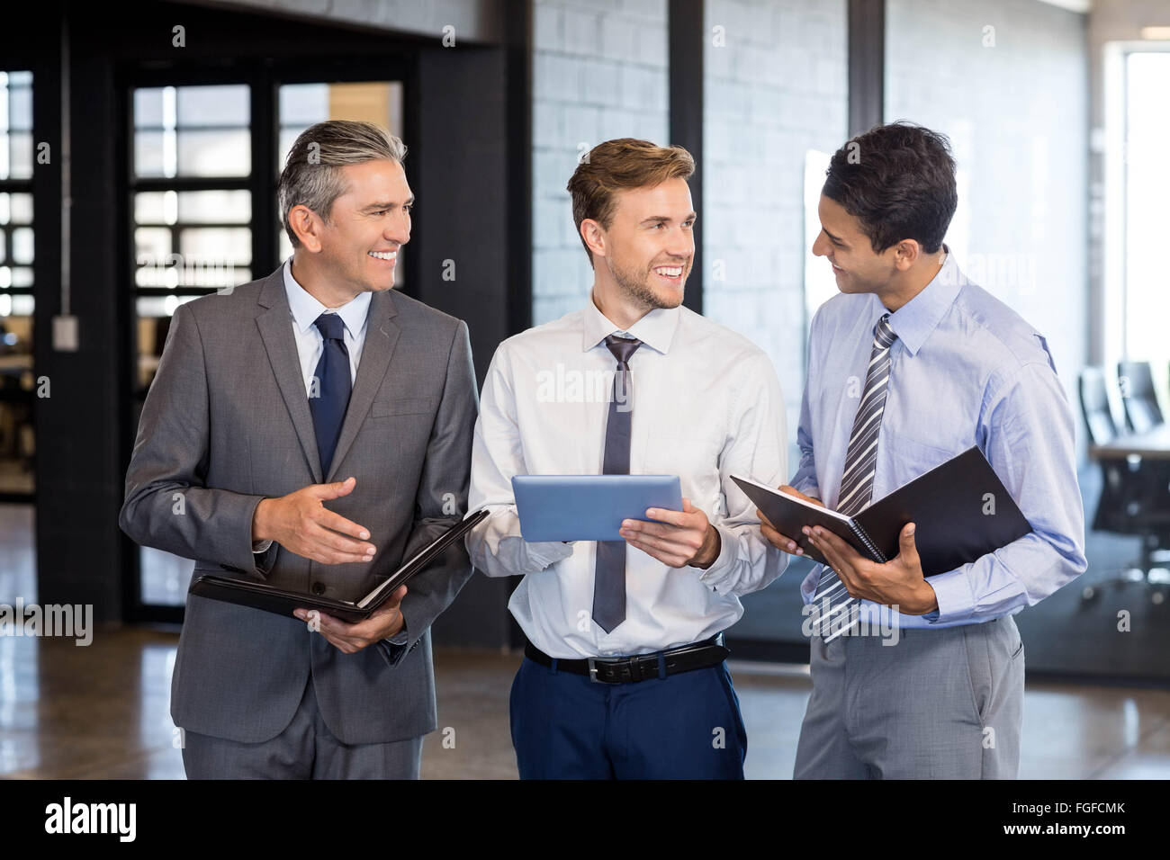 Business team interact using digital tablet and organizer Stock Photo ...