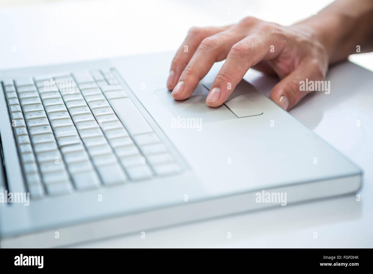 Close up view of a male hand using laptop Stock Photo - Alamy