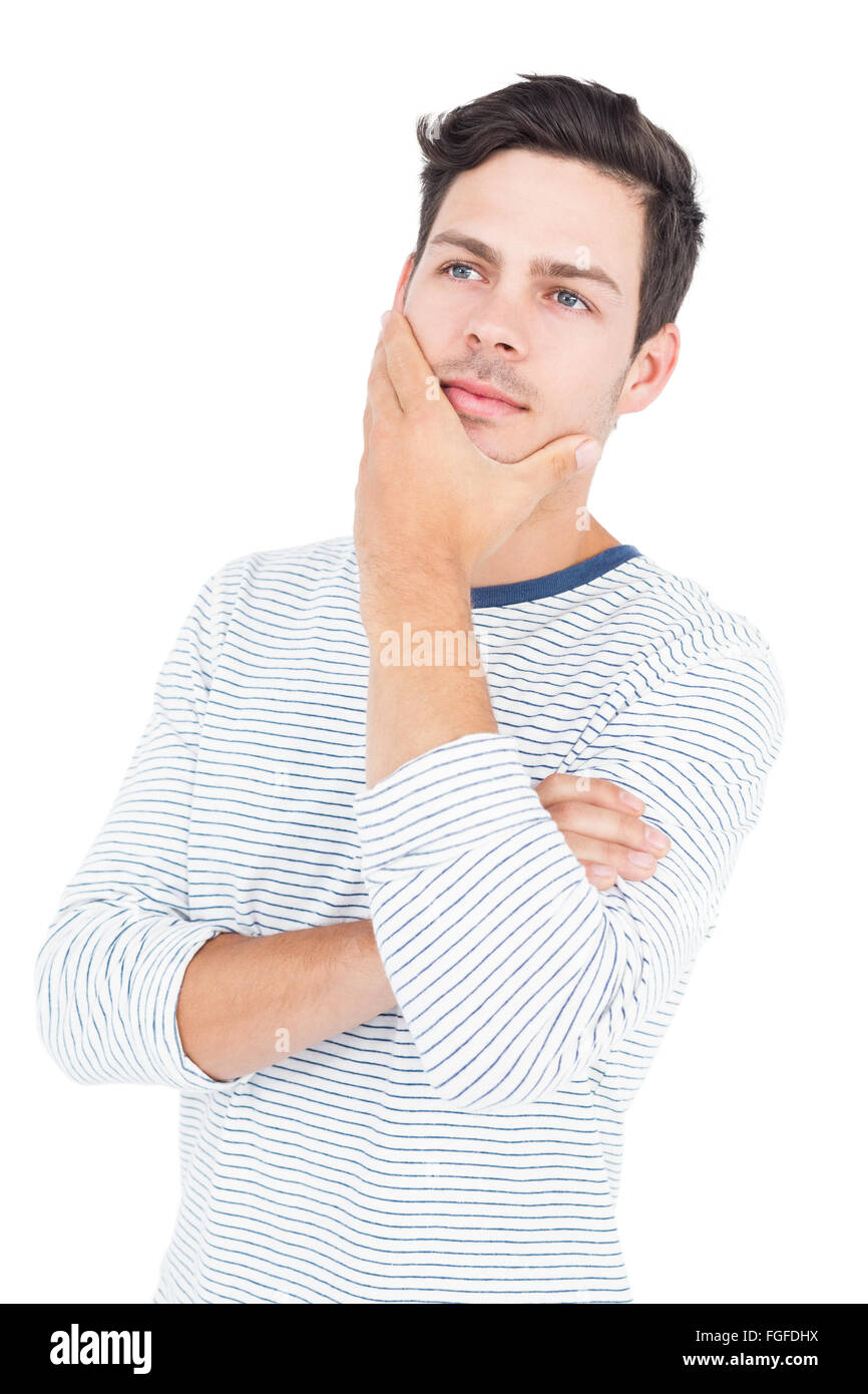 Thoughtful man with hand on chin Stock Photo - Alamy