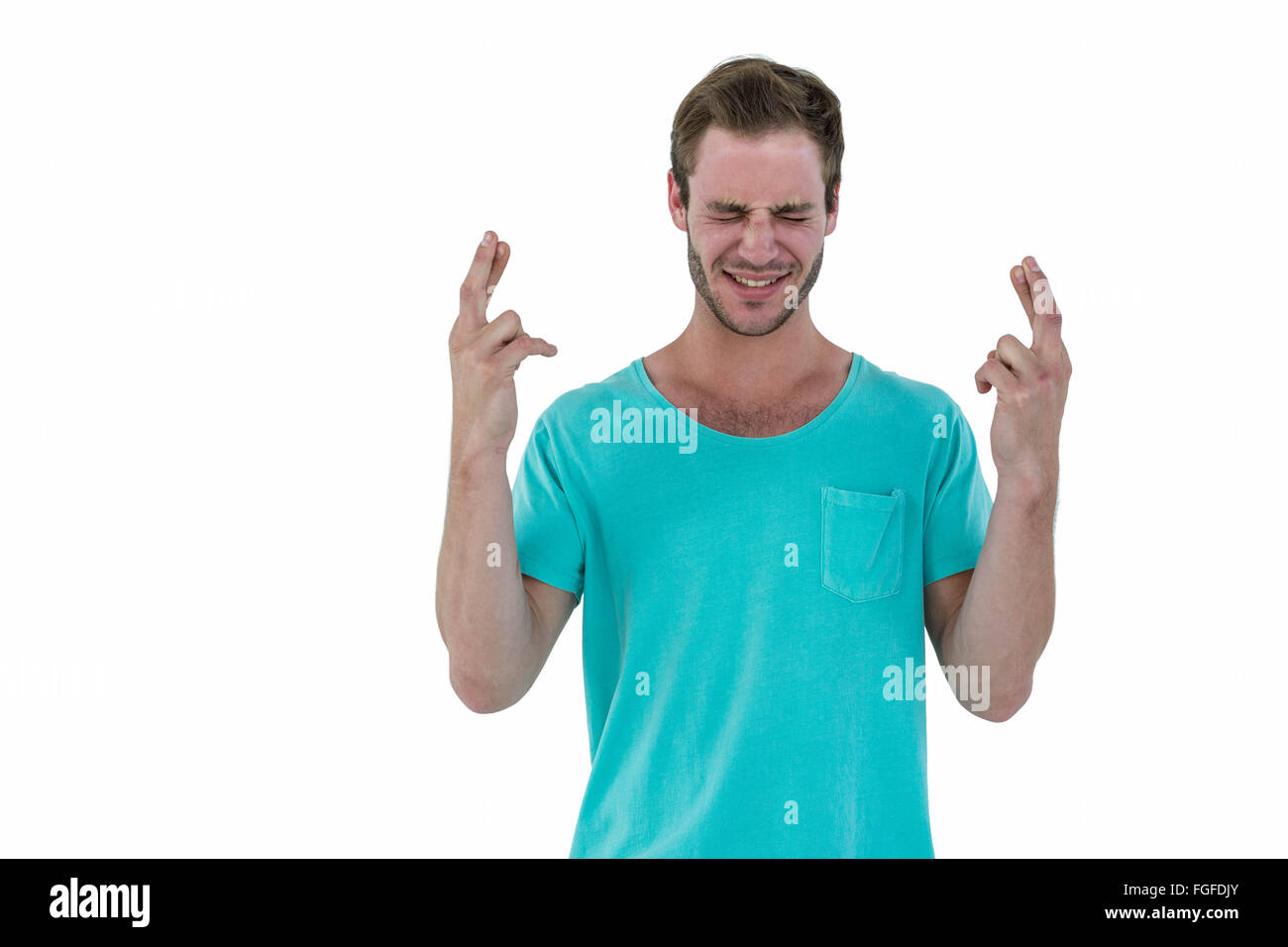 Man fingers crossed hi-res stock photography and images - Alamy