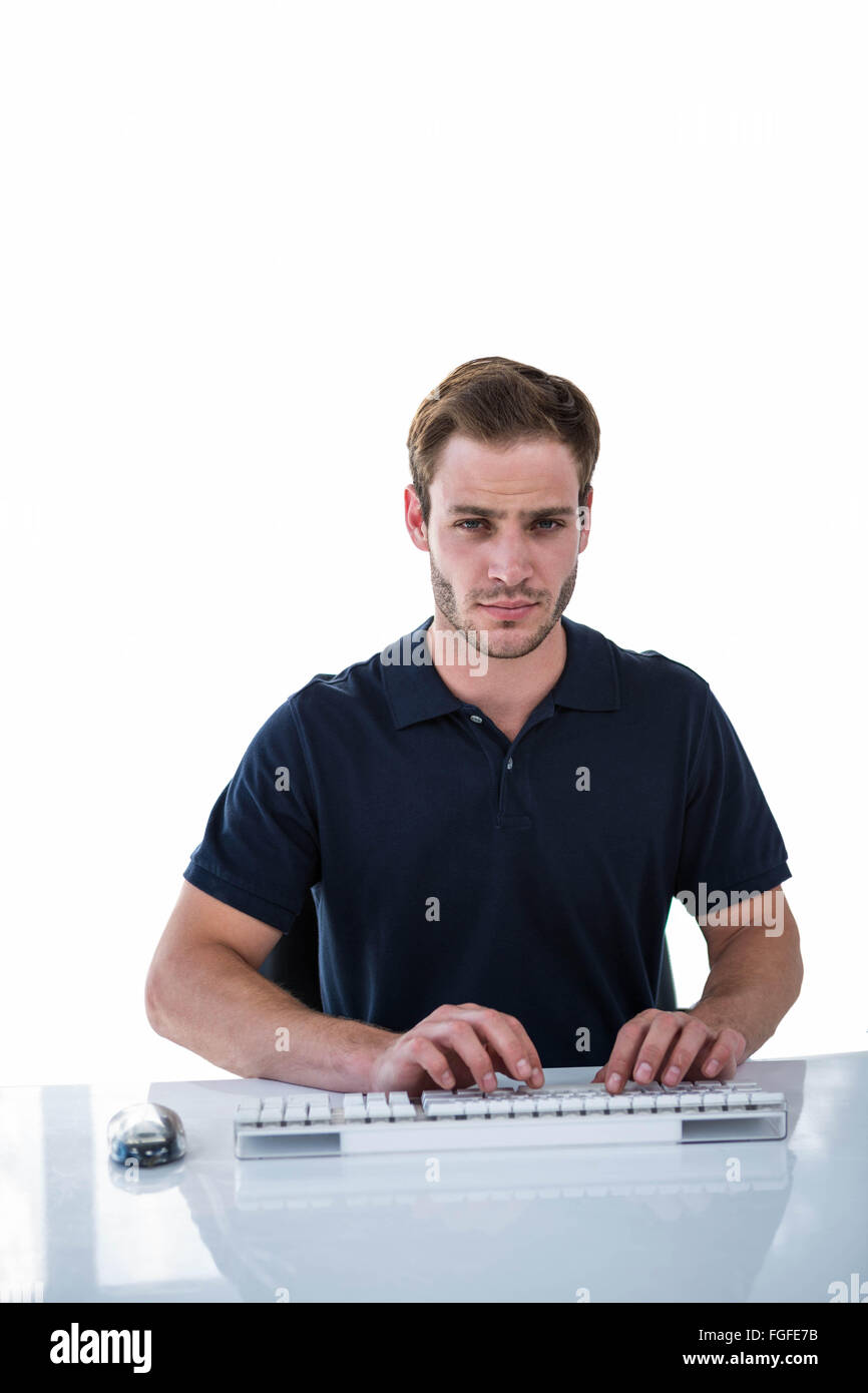 Handsome man using computer Stock Photo - Alamy