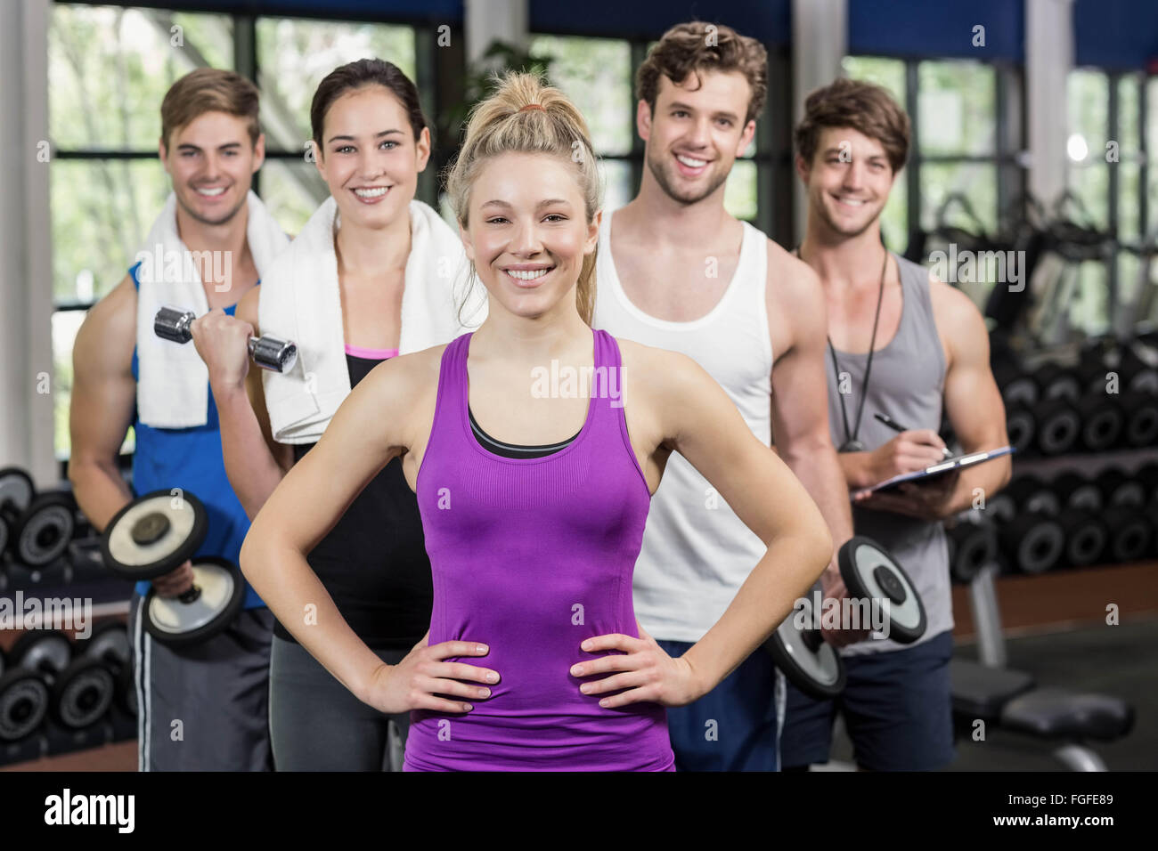 Fit people with sports equipment Stock Photo - Alamy