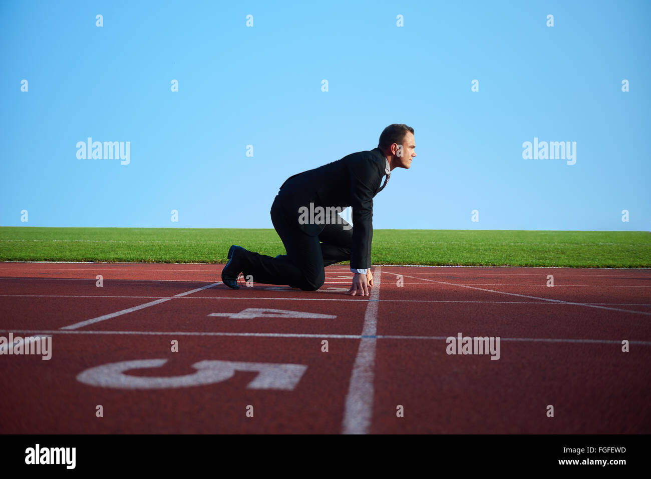 business man ready to sprint Stock Photo - Alamy