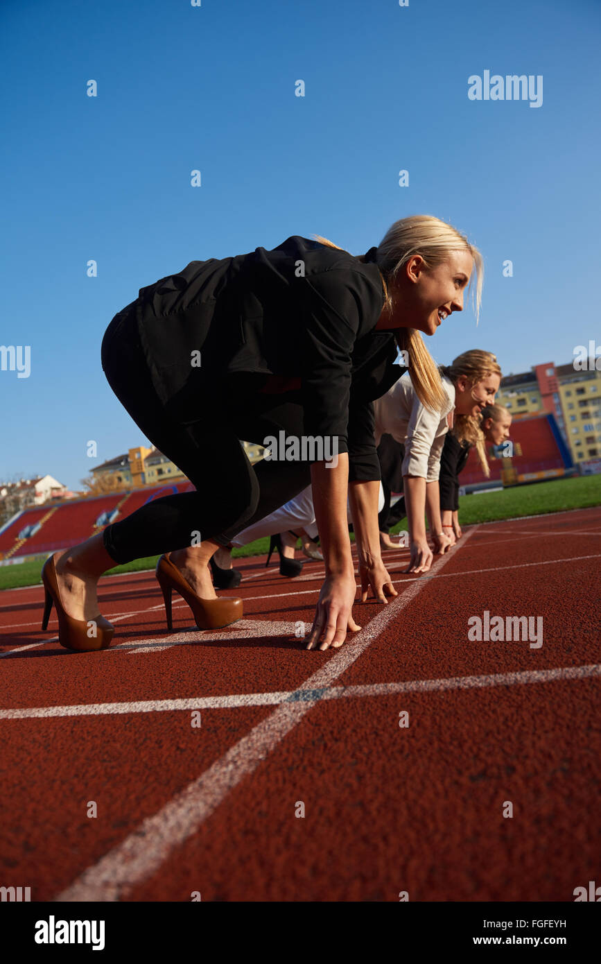 business people running on racing track Stock Photo - Alamy