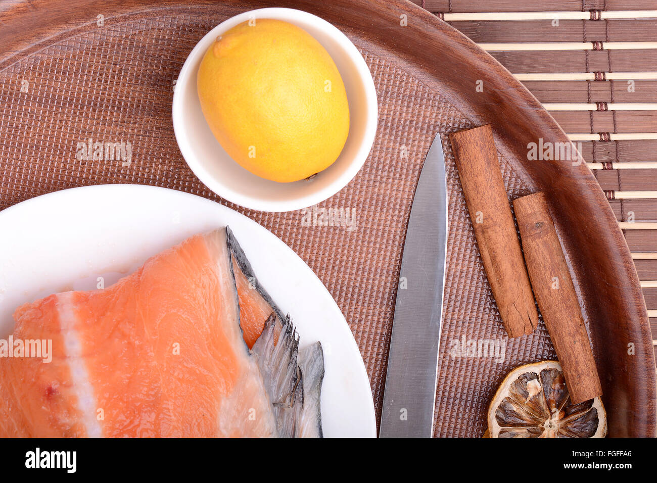 Slice of red fish salmon with fruits and cinnamon Stock Photo - Alamy