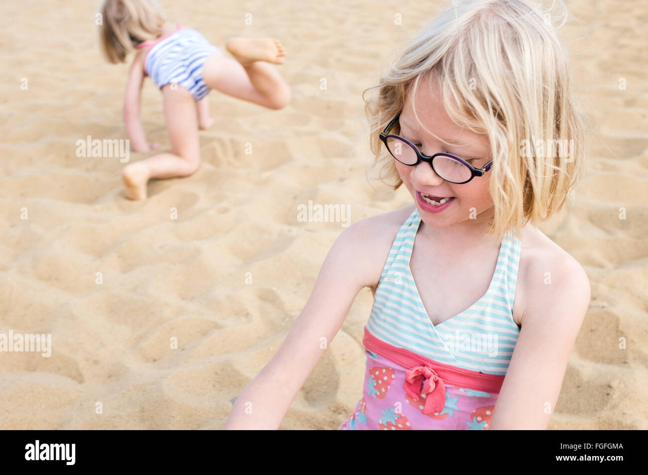Playing beach sand hi-res stock photography and images - Alamy