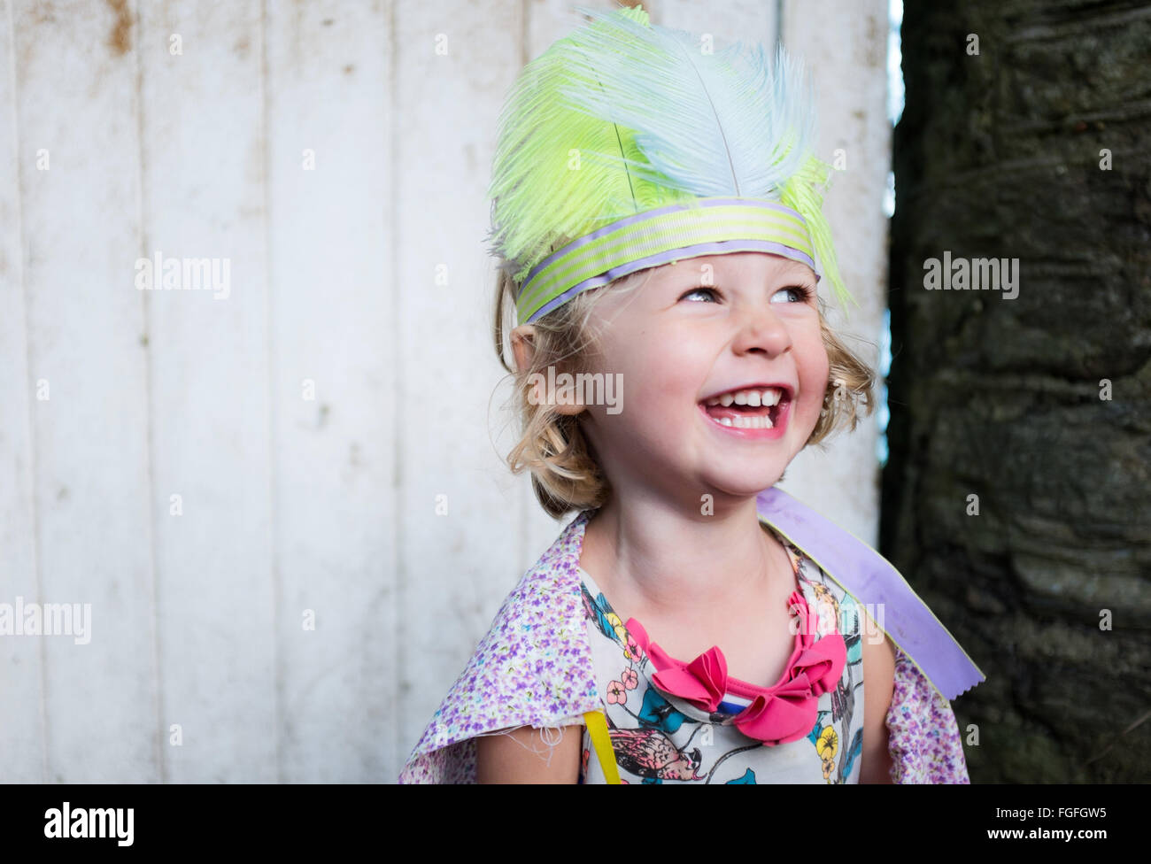 Purple feather headdress hi-res stock photography and images - Alamy