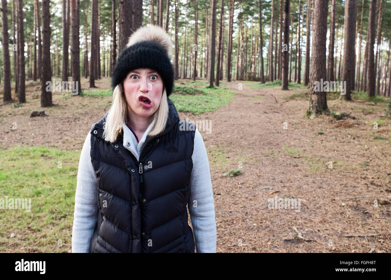 woman pulling a face Stock Photo - Alamy