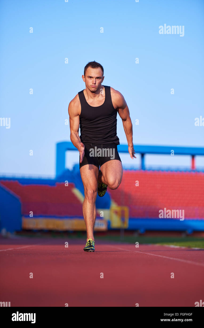Athletic man start Stock Photo - Alamy