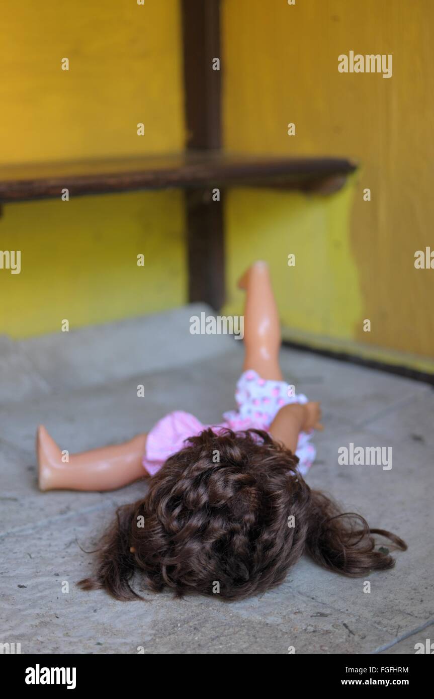 Abandoned female doll Stock Photo - Alamy