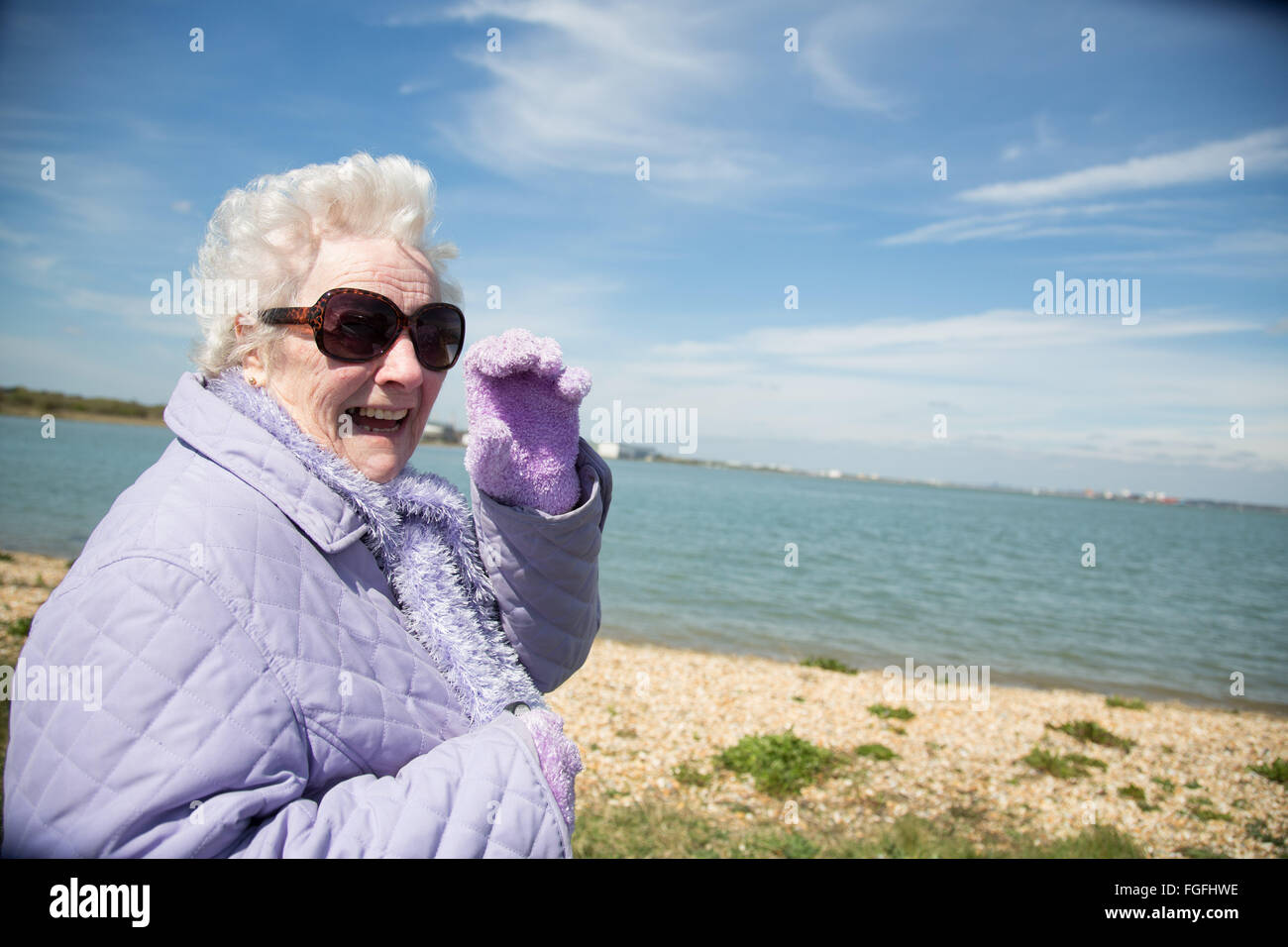 Older Lady on the beach Stock Photo - Alamy