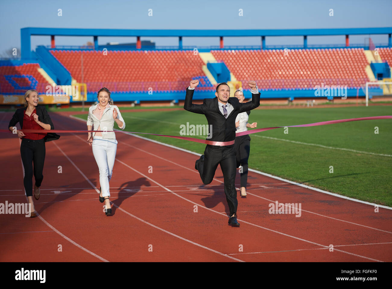 business people running on racing track Stock Photo - Alamy