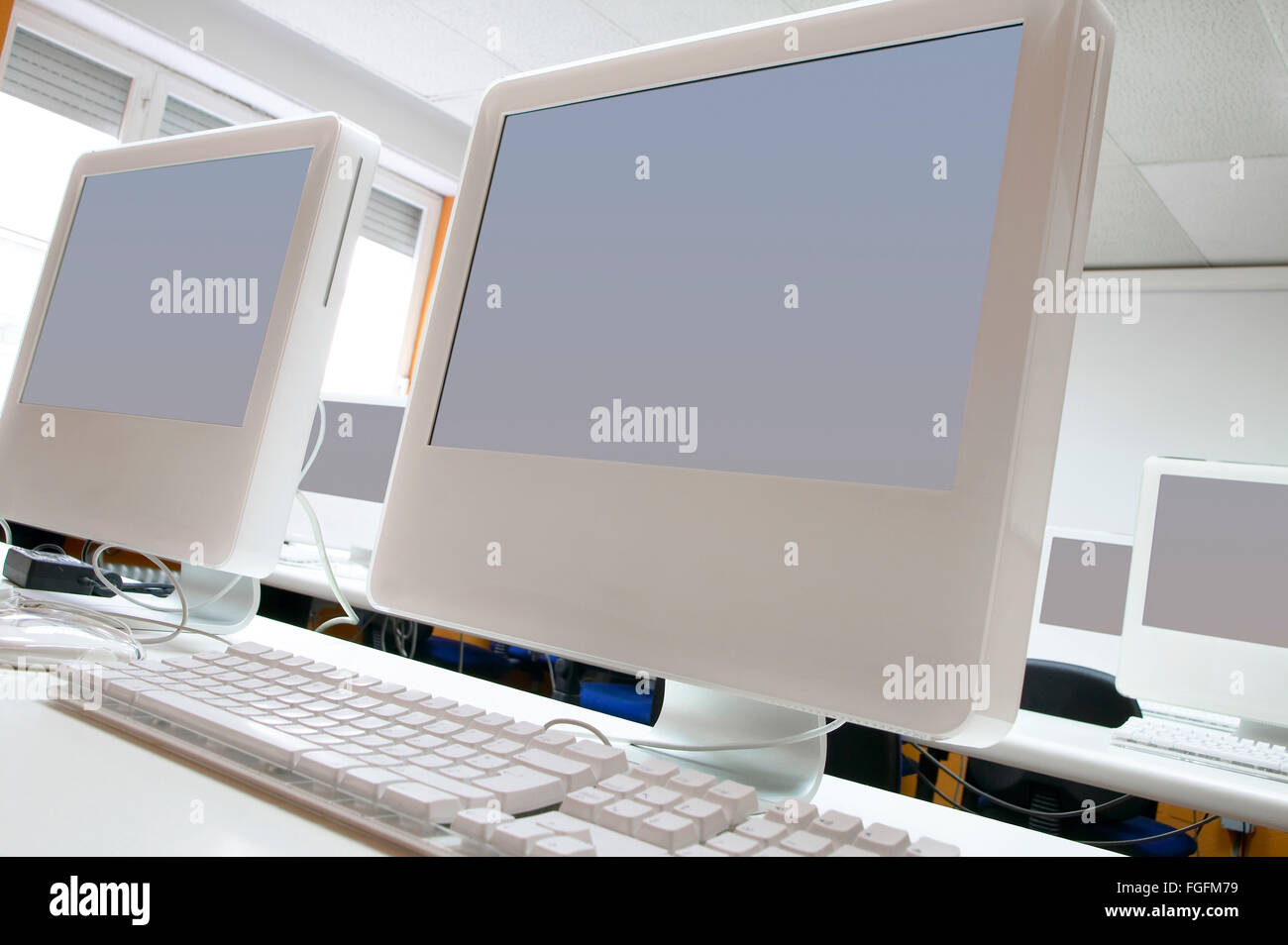 Classroom with computers and blank screens. Horizontal Stock Photo - Alamy