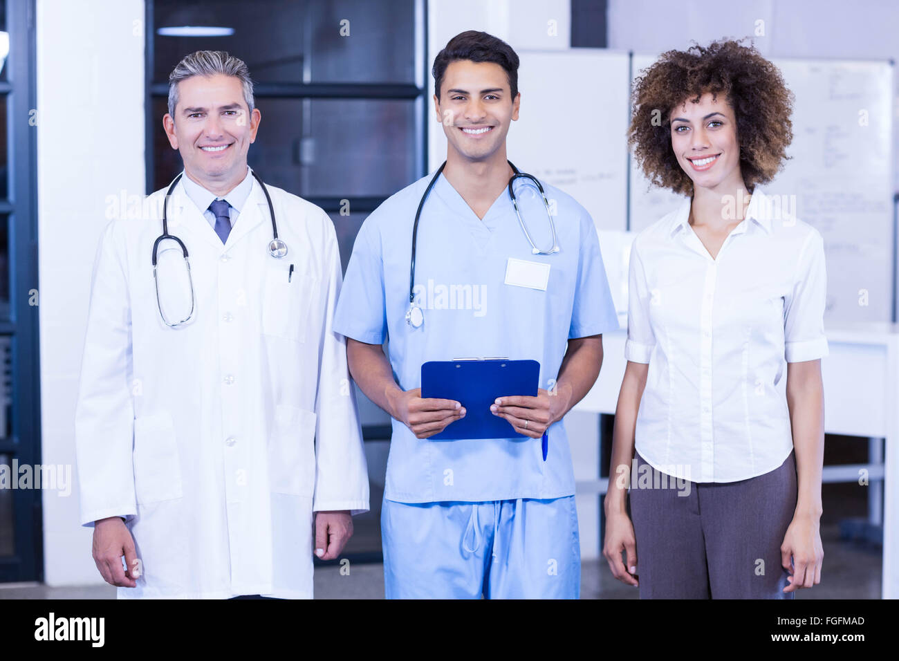 Portrait of medical team standing together Stock Photo - Alamy