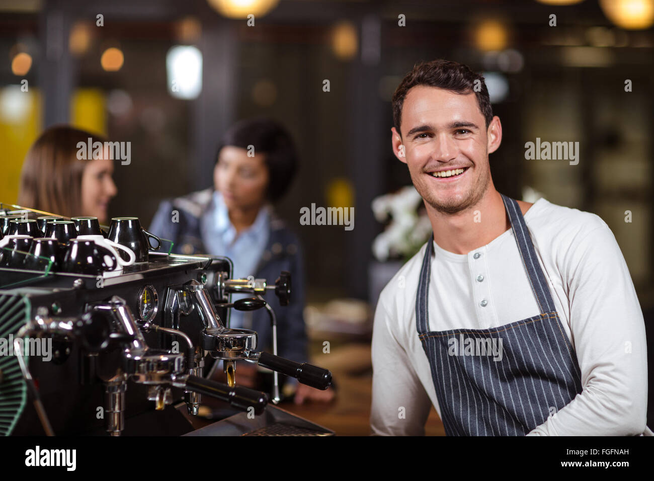 Portrait smiling female barista standing hi-res stock photography and ...