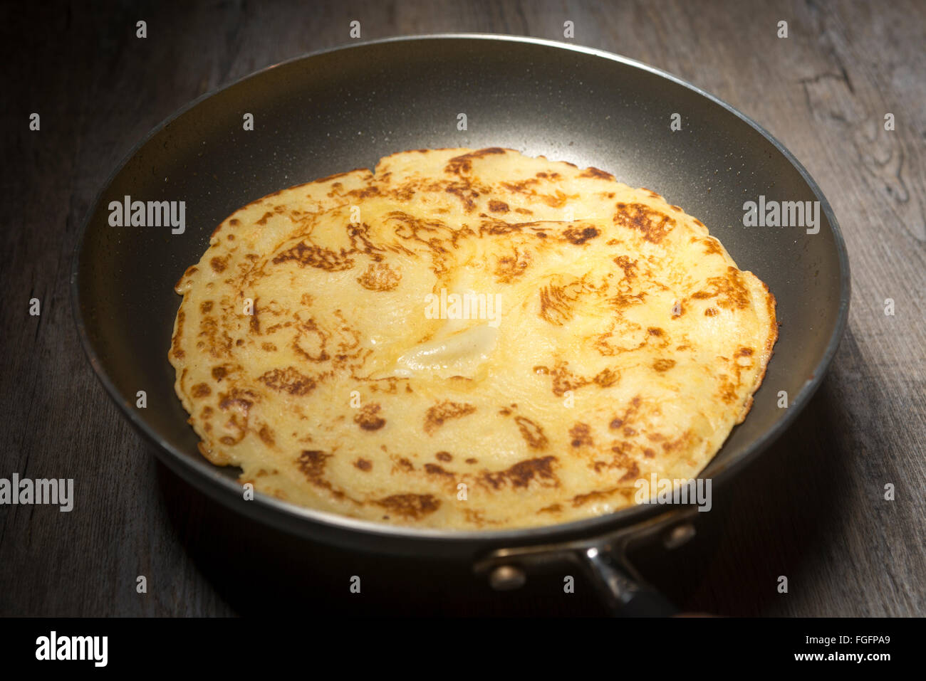 homemade pancake cooking in a frying pan Stock Photo - Alamy