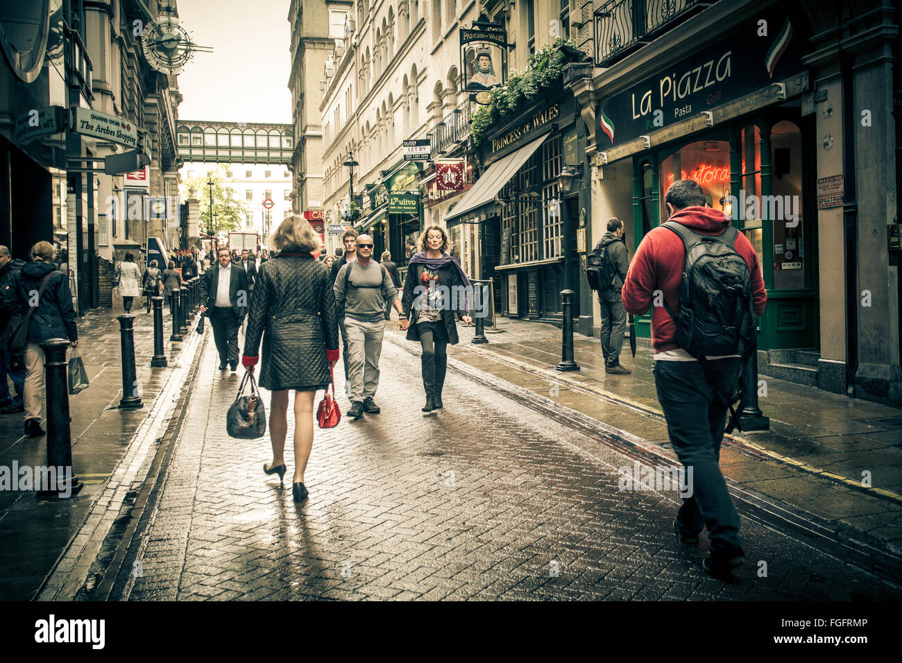 Street scene in the Charing Cross district of London on damp day with ...