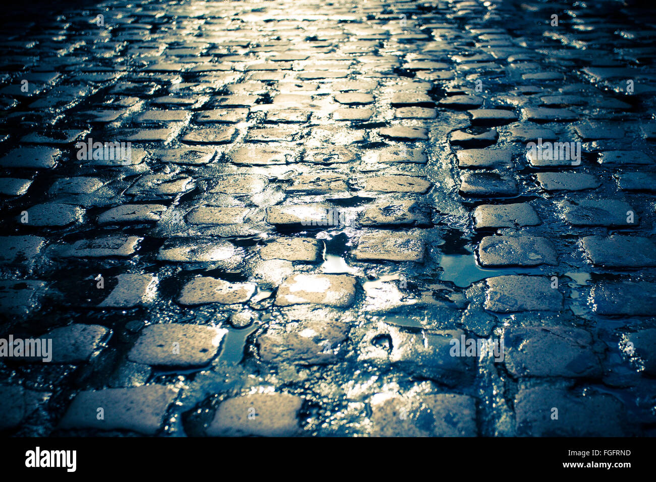 Wet cobblestones on street hi-res stock photography and images - Alamy