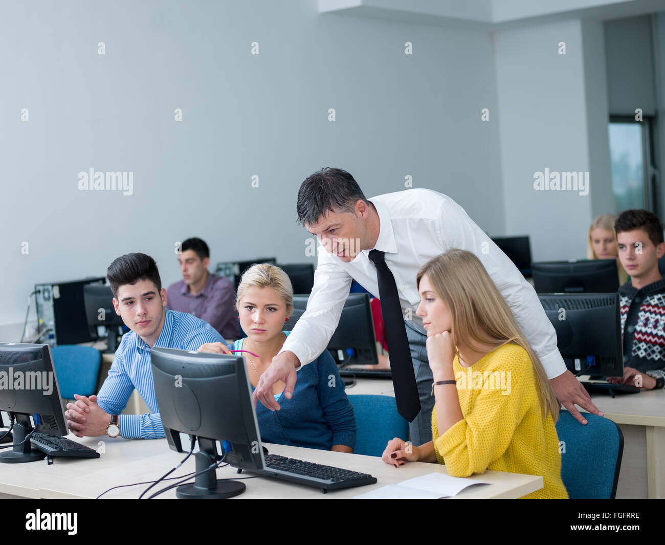 students with teacher in computer lab classrom Stock Photo - Alamy