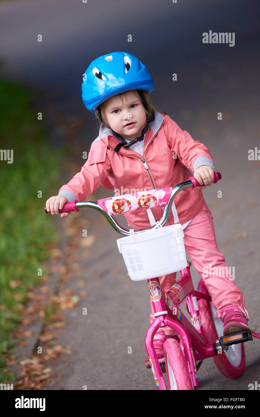 little girl with bicycle Stock Photo - Alamy