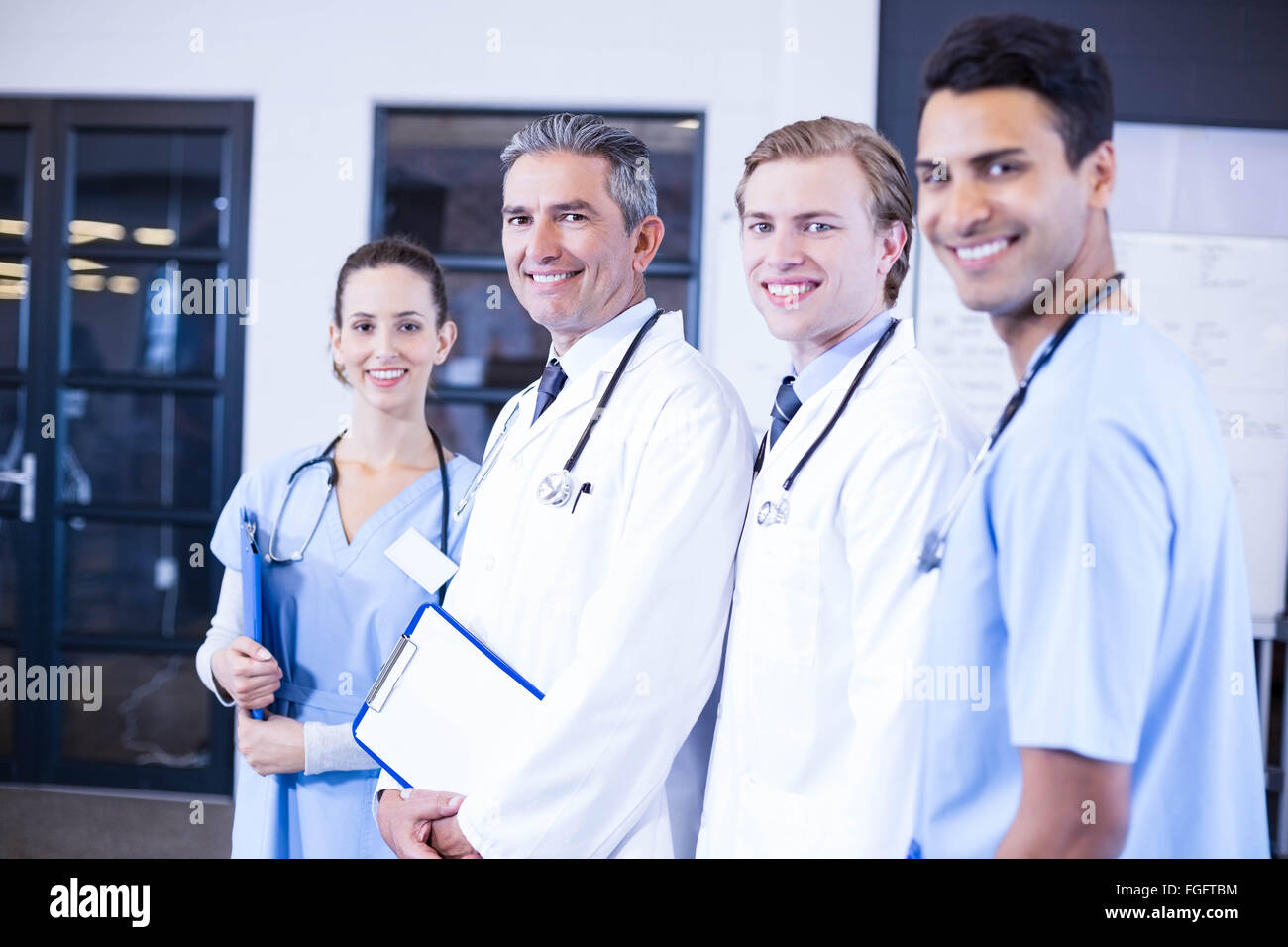 Portrait of medical team standing together Stock Photo - Alamy