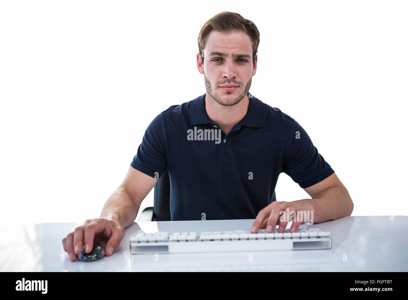 Handsome man using computer Stock Photo - Alamy