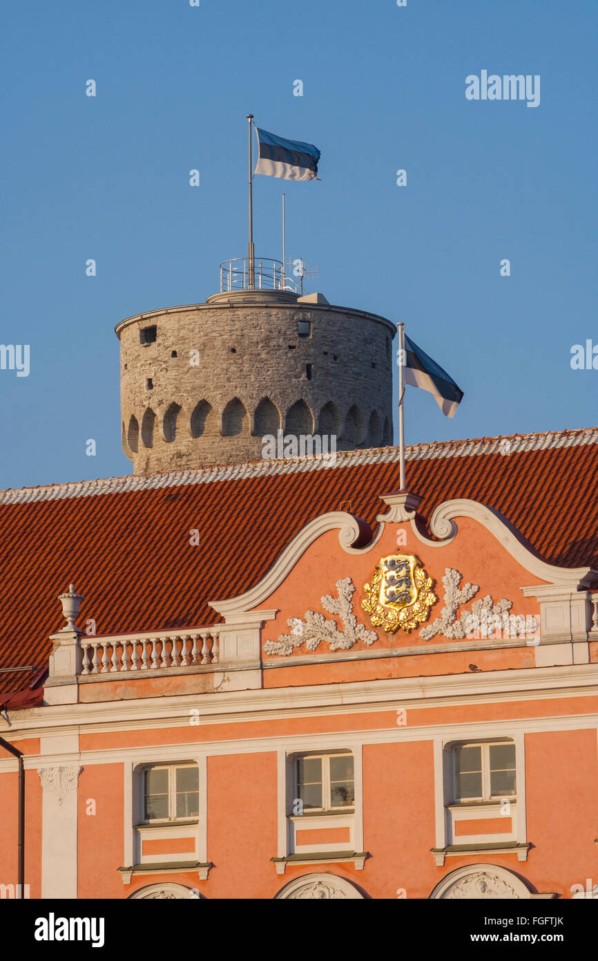 Coat of arms and Estonian national flag above the Estonian Parliament ...