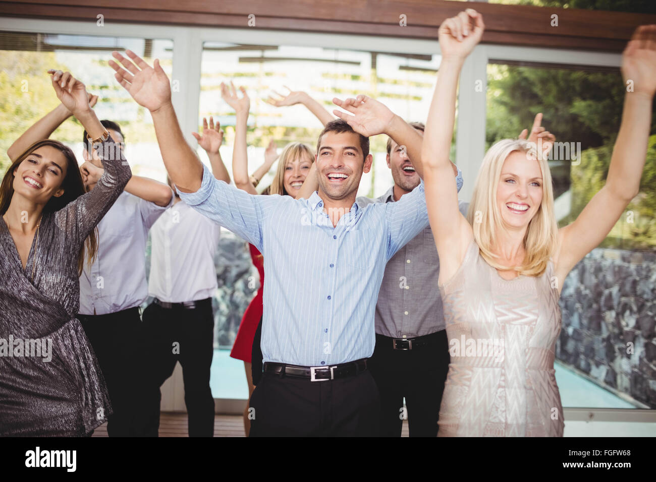 Group of young friends dancing Stock Photo - Alamy