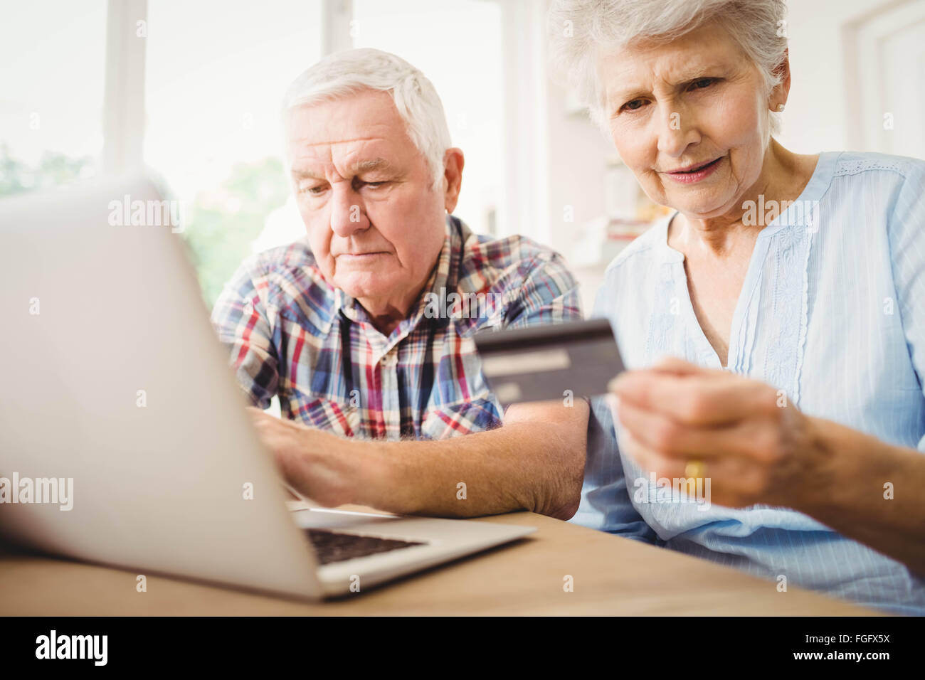 Old man woman paying online hi-res stock photography and images - Alamy