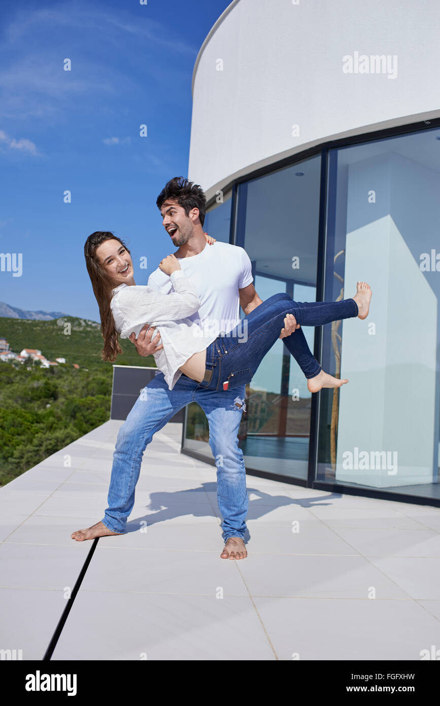 happy young romantic couple have fun arelax relax at home Stock Photo ...
