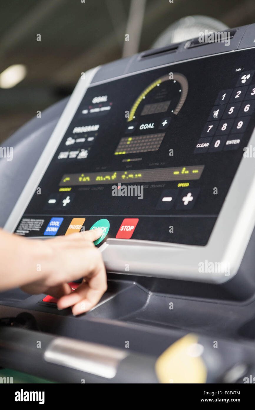 Person changing the adjustment of a fitness machine Stock Photo - Alamy