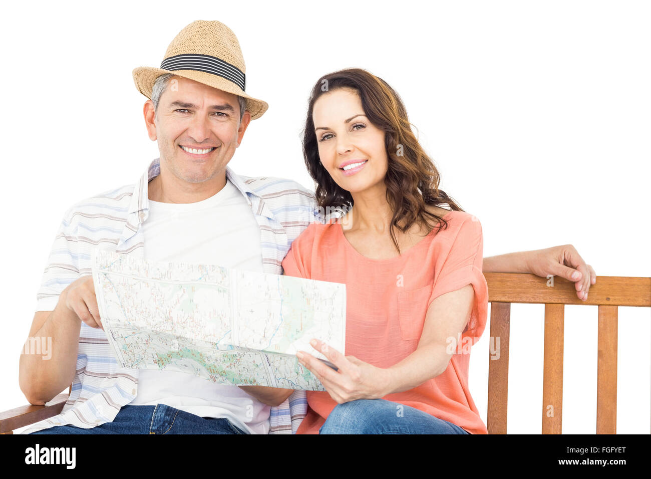 Couple on bench looking at map Stock Photo - Alamy