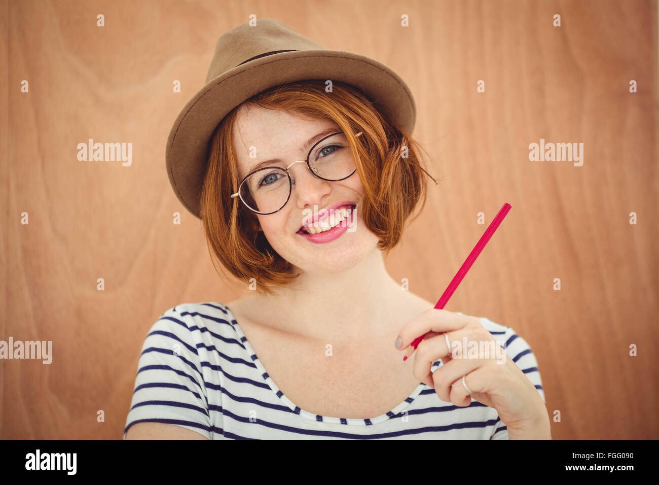 Woman portrait smiling pen hi-res stock photography and images - Alamy