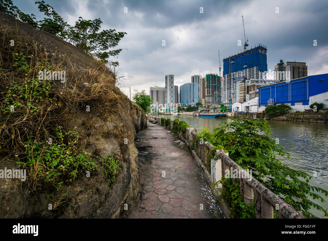 Buildings in Mandaluyong and the Pasig River, in Makati, Metro Manila ...