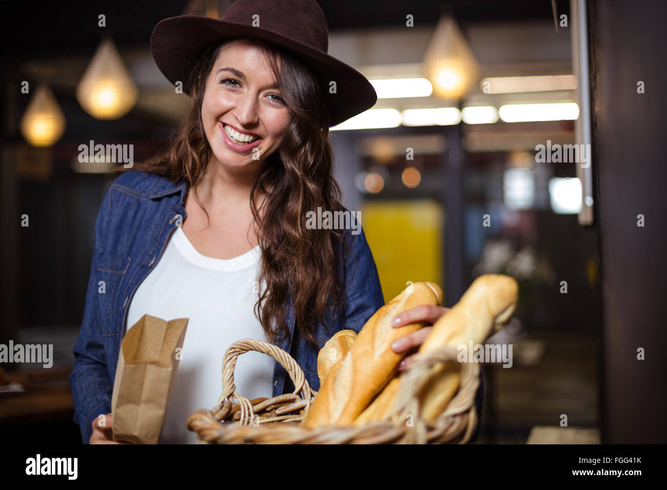 Woman standing touching work hi-res stock photography and images - Alamy