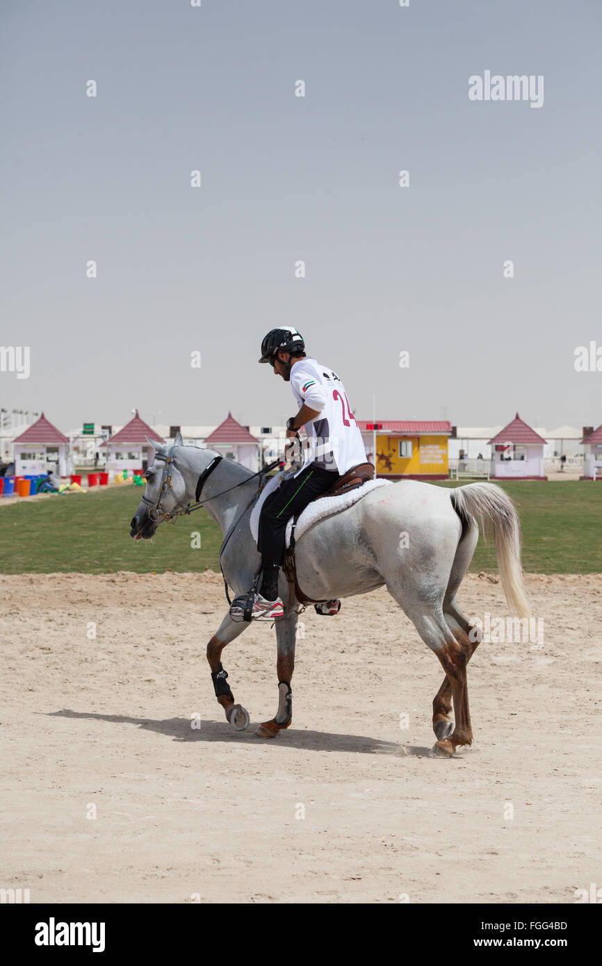 Rider returns to the Endurance Village at the end of a race stage Stock ...
