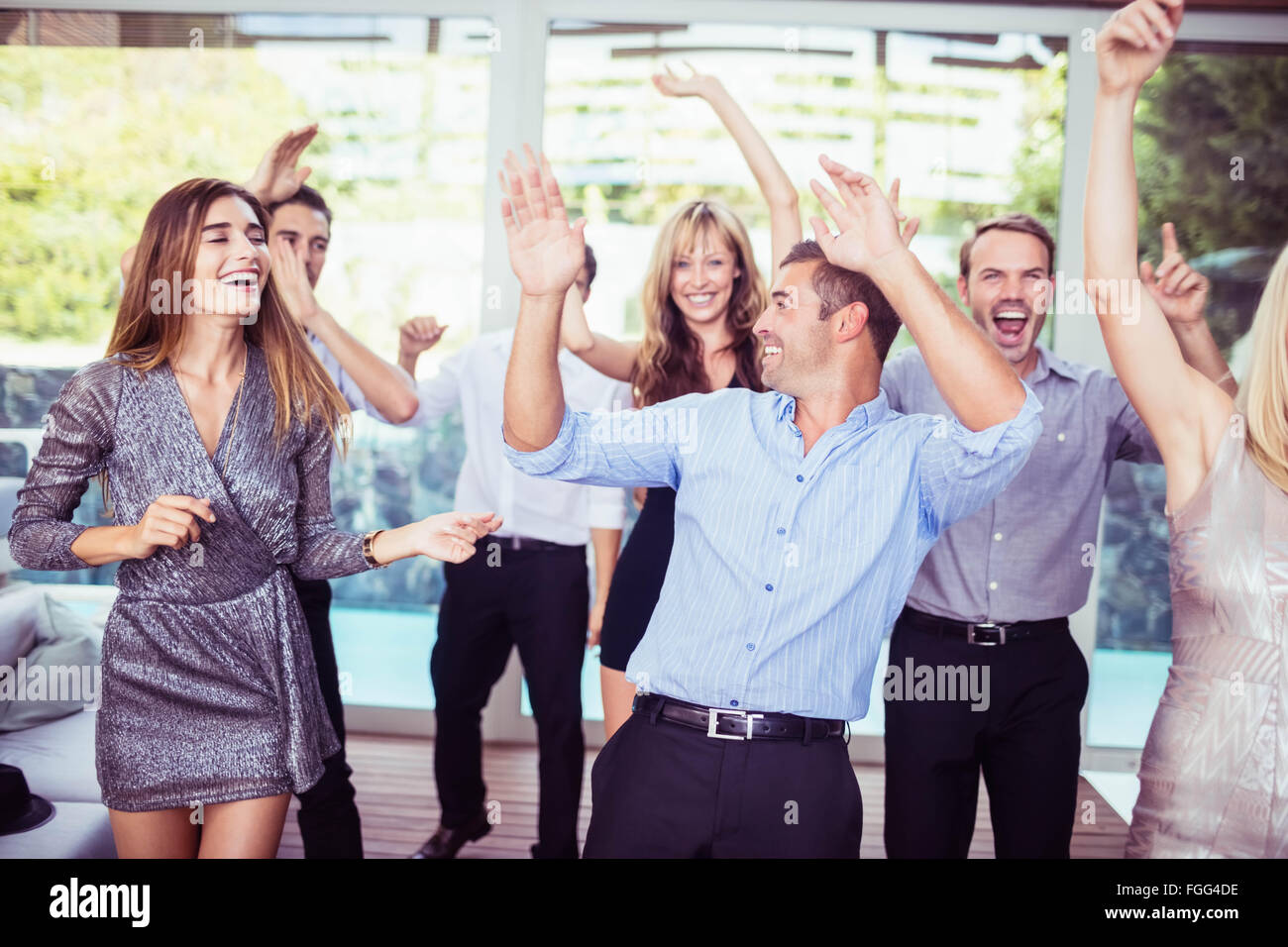Group of young friends dancing Stock Photo - Alamy