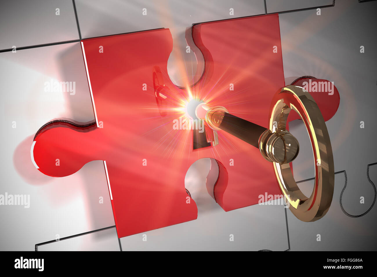Key unlocking jigsaw Stock Photo - Alamy